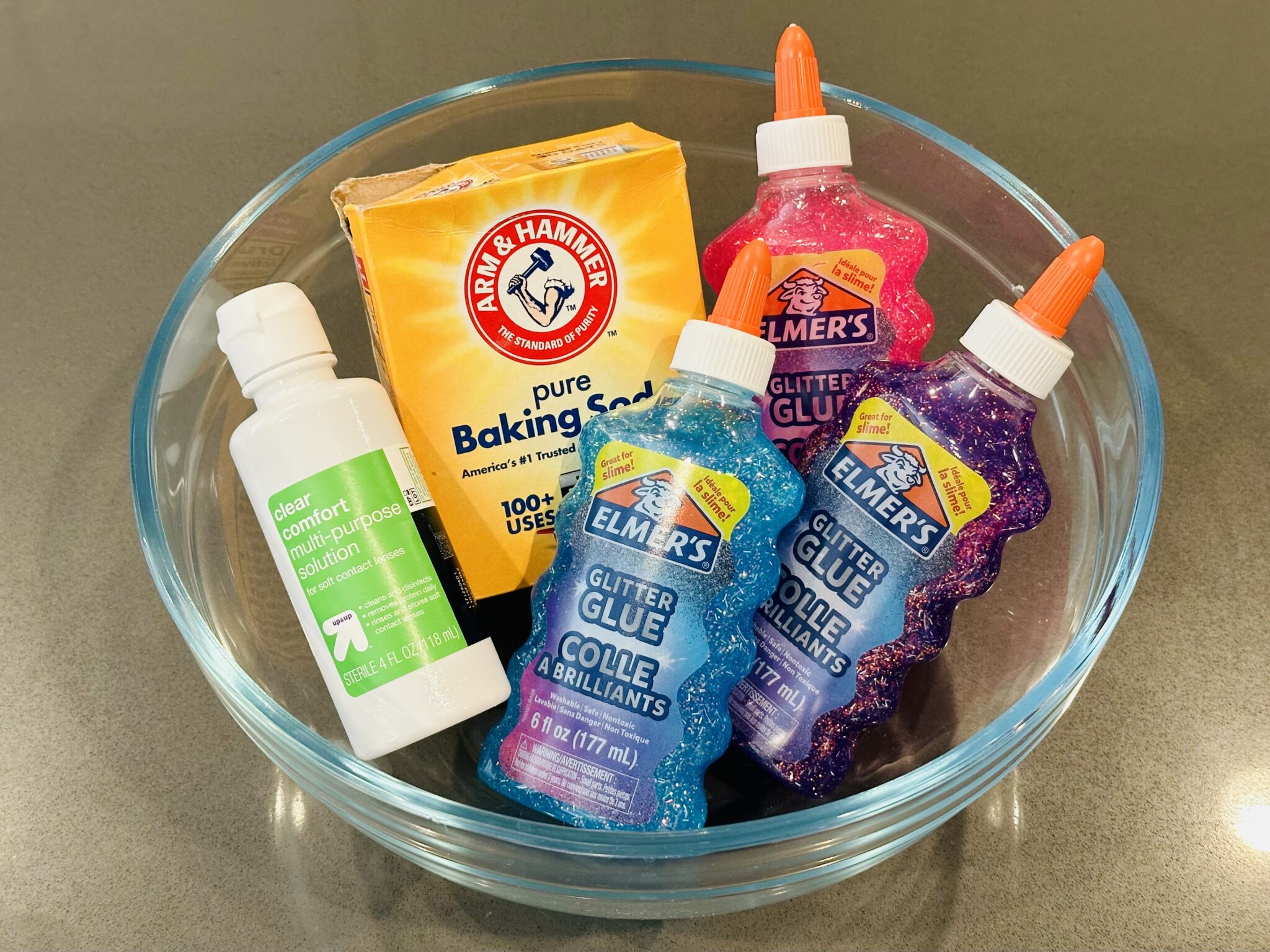 How to Make Awesome Glitter Glue Slime - Raising Wild Things Sensory