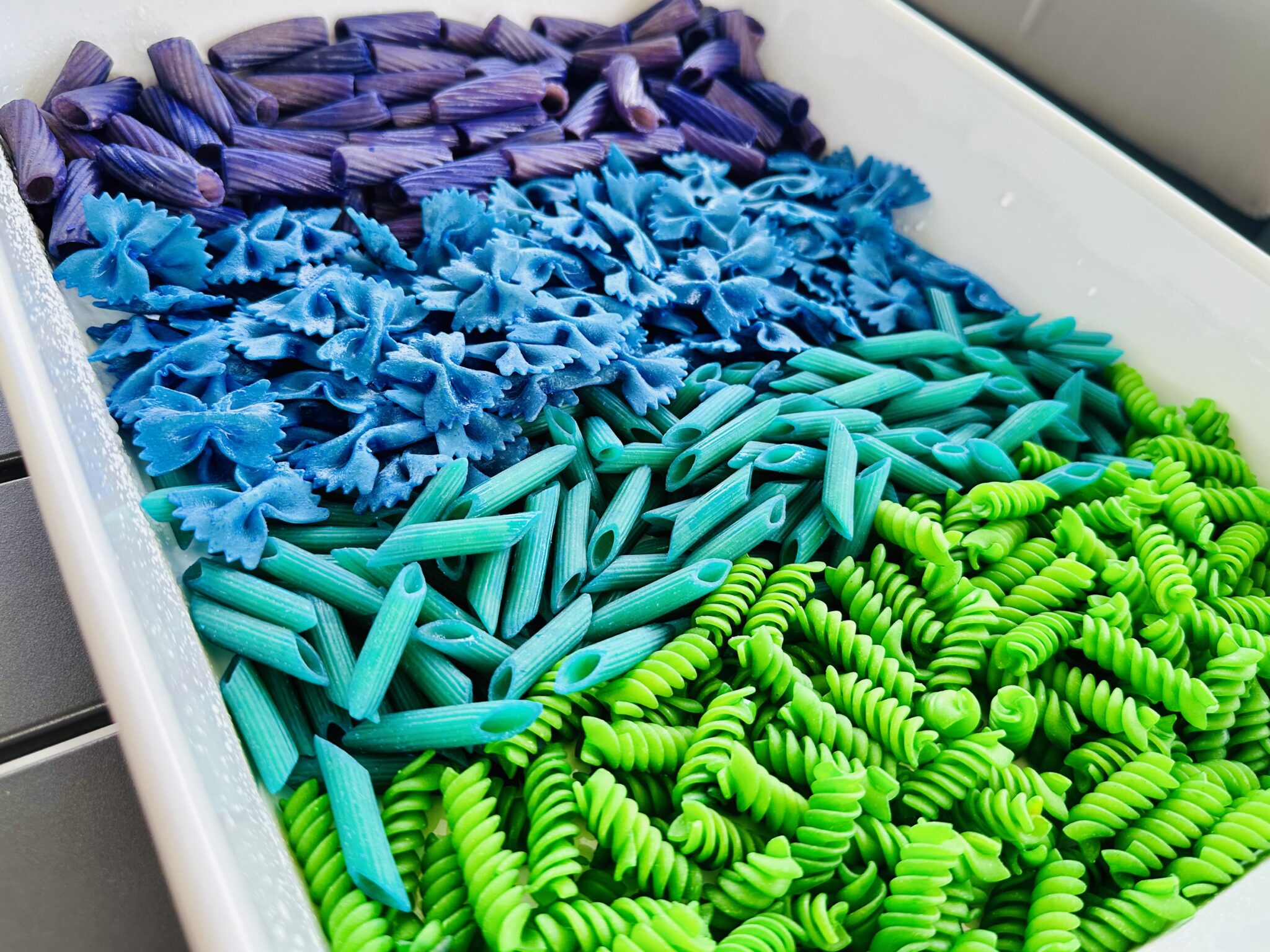 How To Dye Pasta Noodles For Sensory Play - Raising Wild Things Sensory