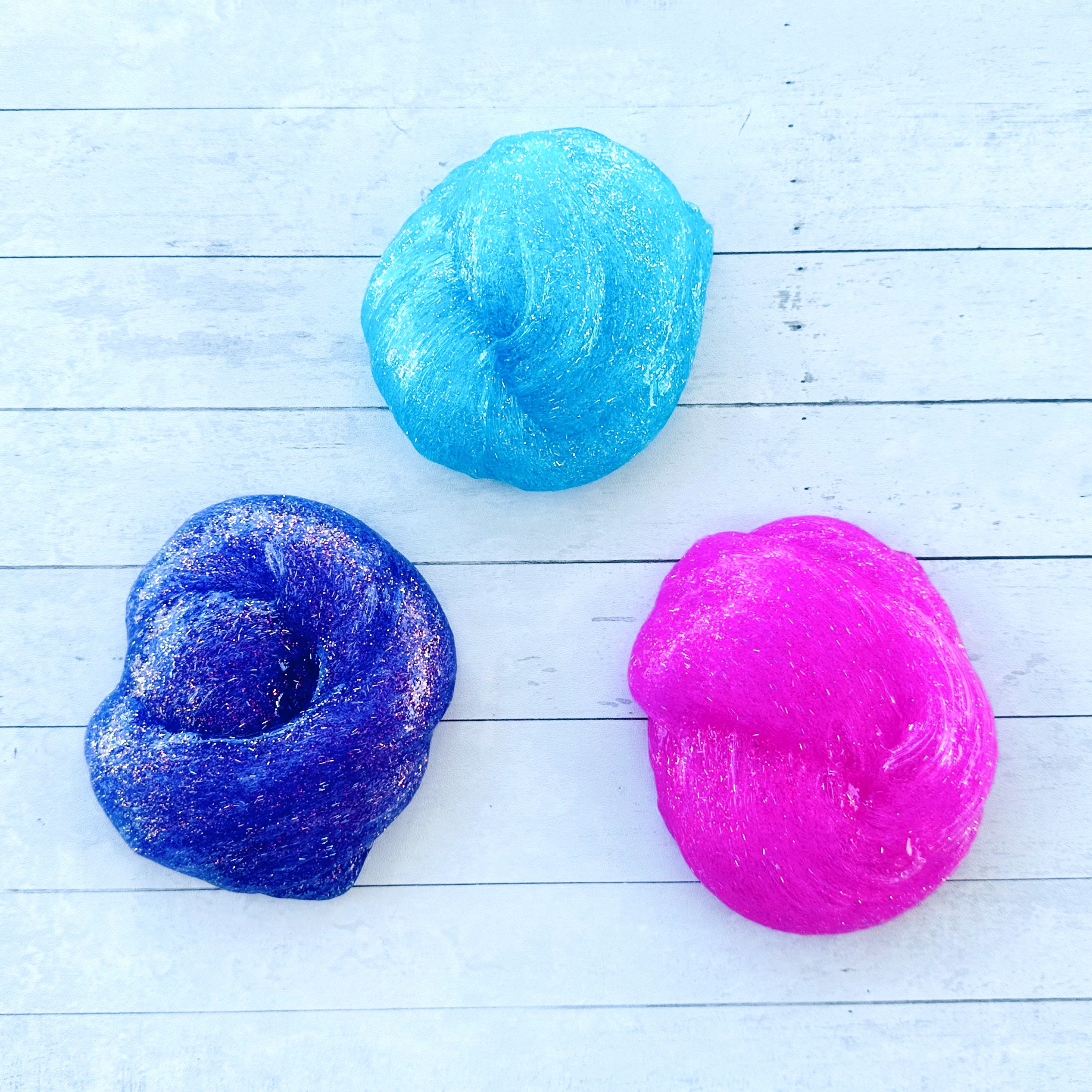How to Make Awesome Glitter Glue Slime - Raising Wild Things Sensory