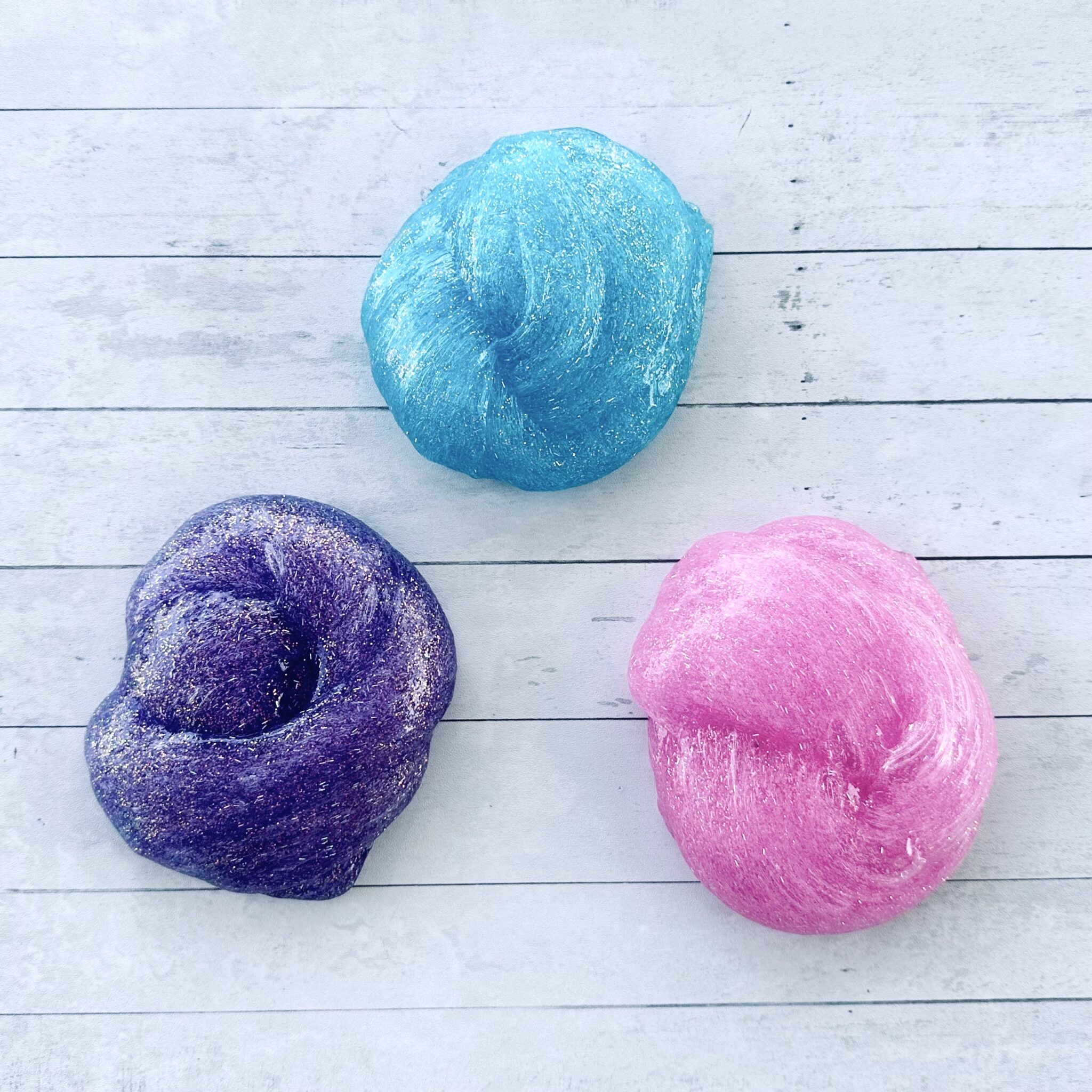 How to Make Awesome Glitter Glue Slime - Raising Wild Things Sensory