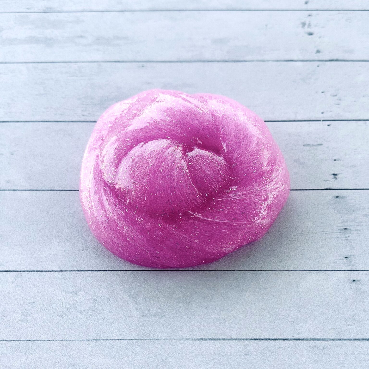 How to Make Awesome Glitter Glue Slime - Raising Wild Things Sensory