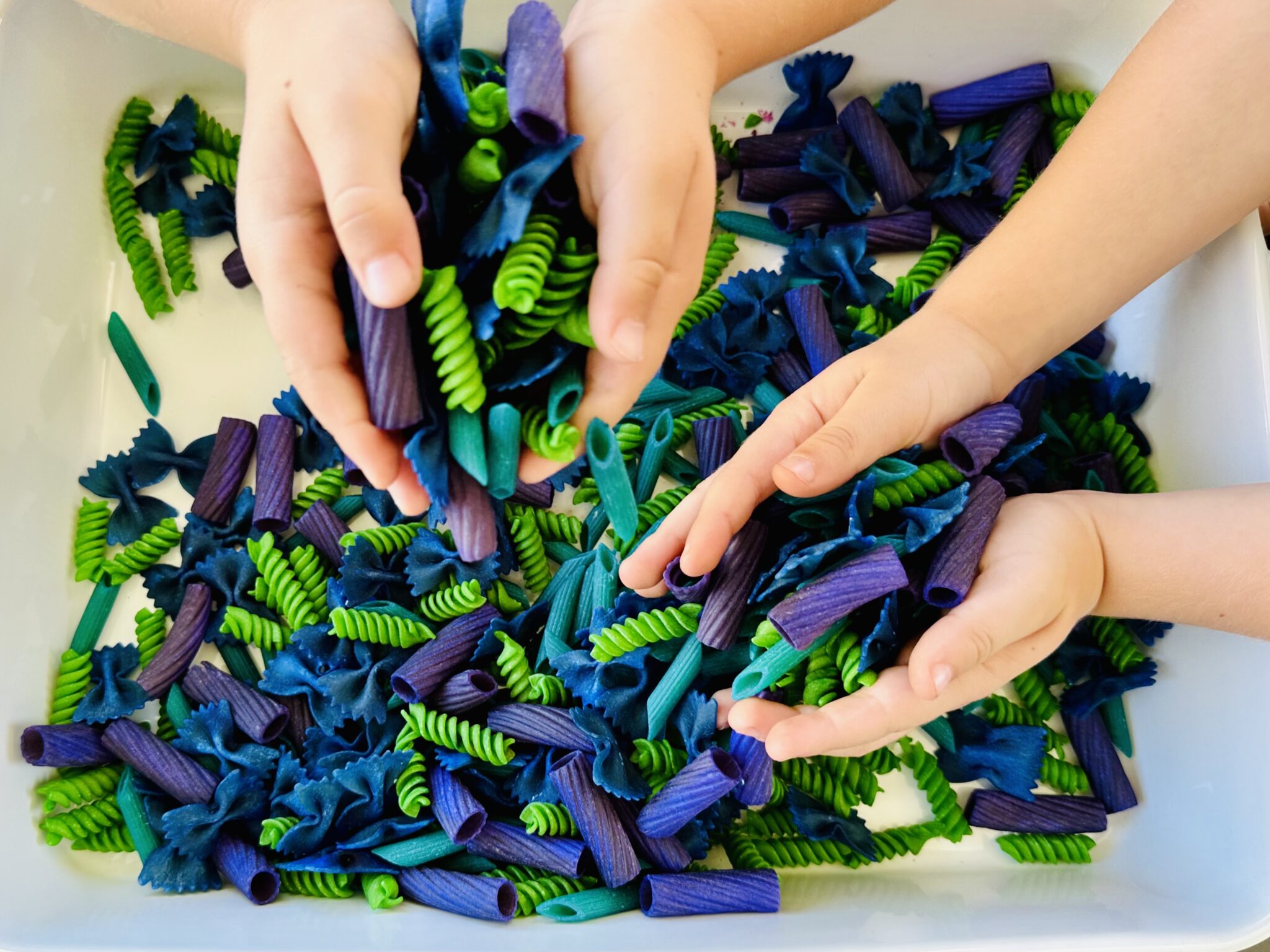 How To Dye Pasta Noodles For Sensory Play - Raising Wild Things Sensory