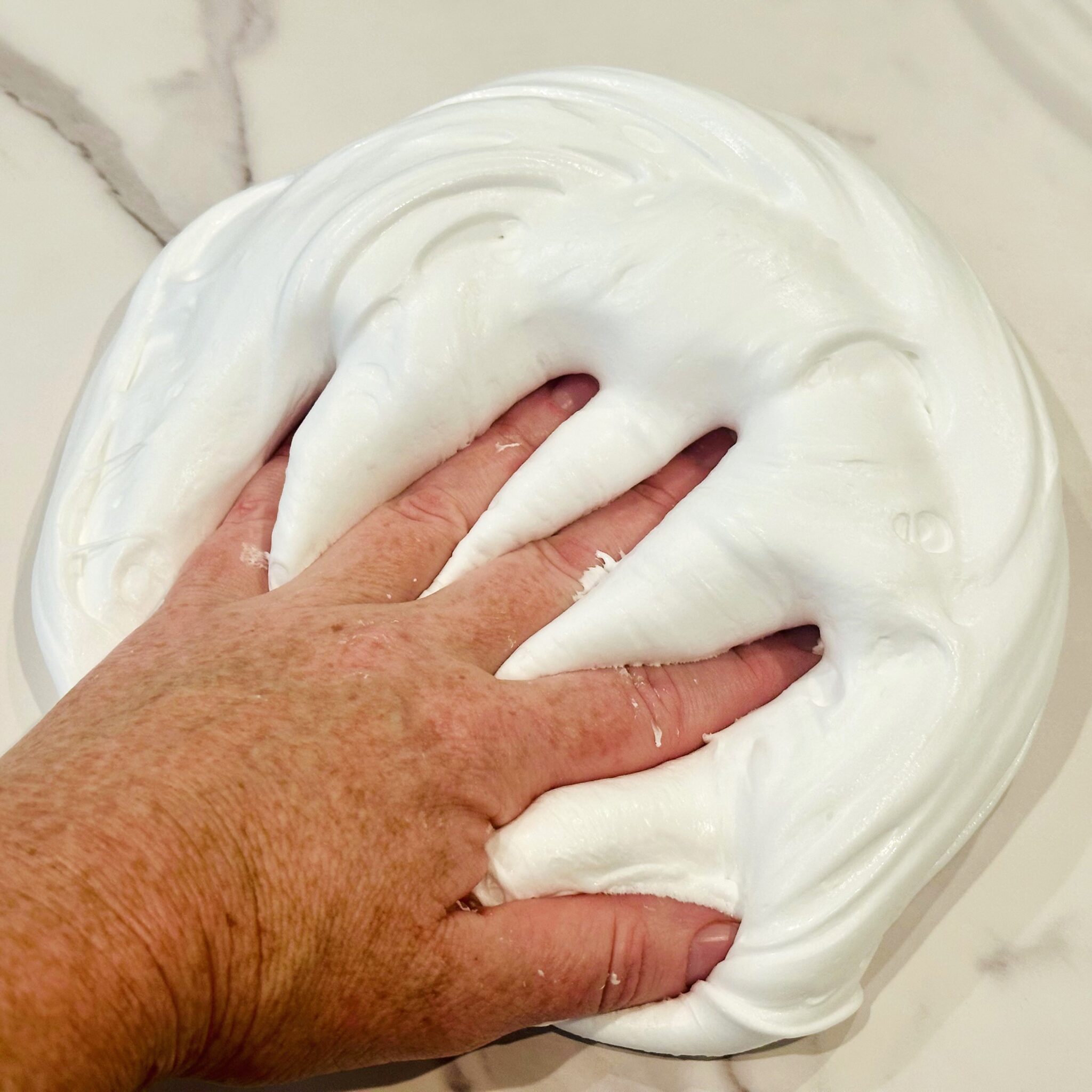 How To Make Fluffy Snow Slime (No Borax!) - Raising Wild Things Sensory