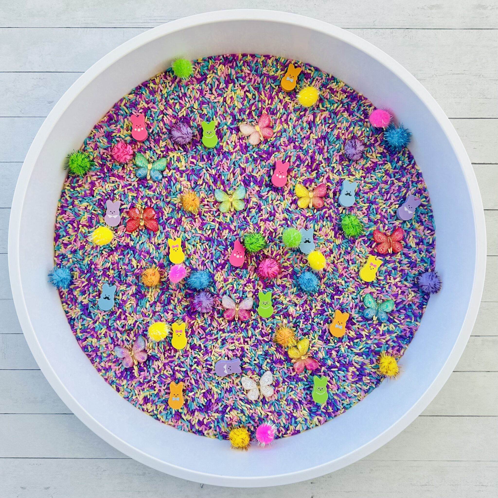 How To Make A Colored Rice Easter Sensory Bin - Raising Wild Things Sensory