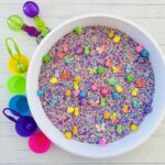 How To Make A Colored Rice Easter Sensory Bin - Raising Wild Things Sensory