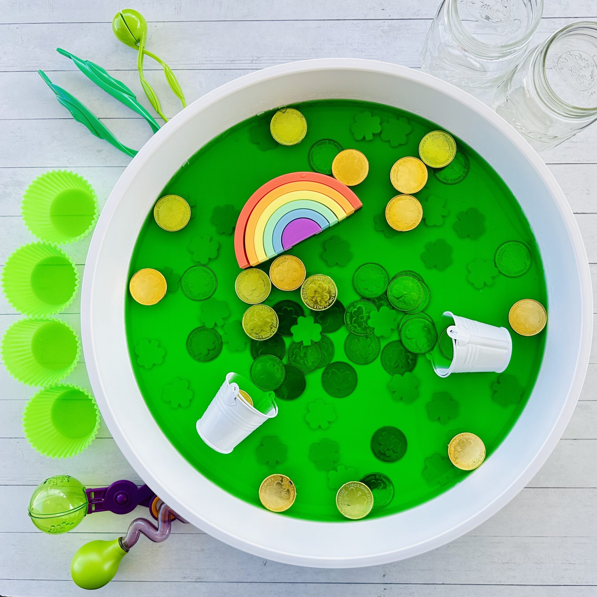 The BEST St. Patrick's Day Jello Sensory Bin - Raising Wild Things Sensory
