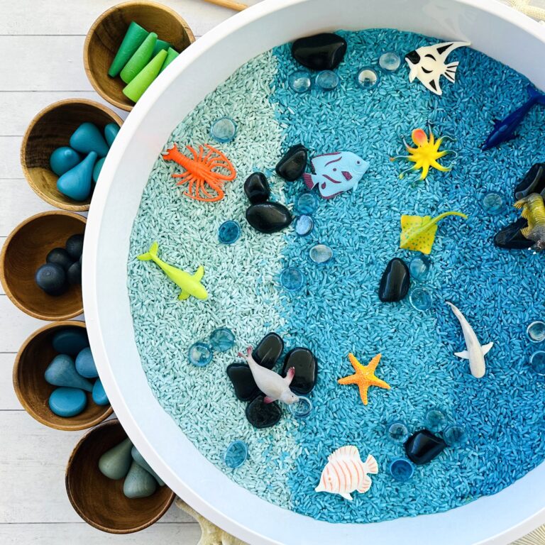 How To Make An Ocean Colored Rice Sensory Bin - Raising Wild Things Sensory