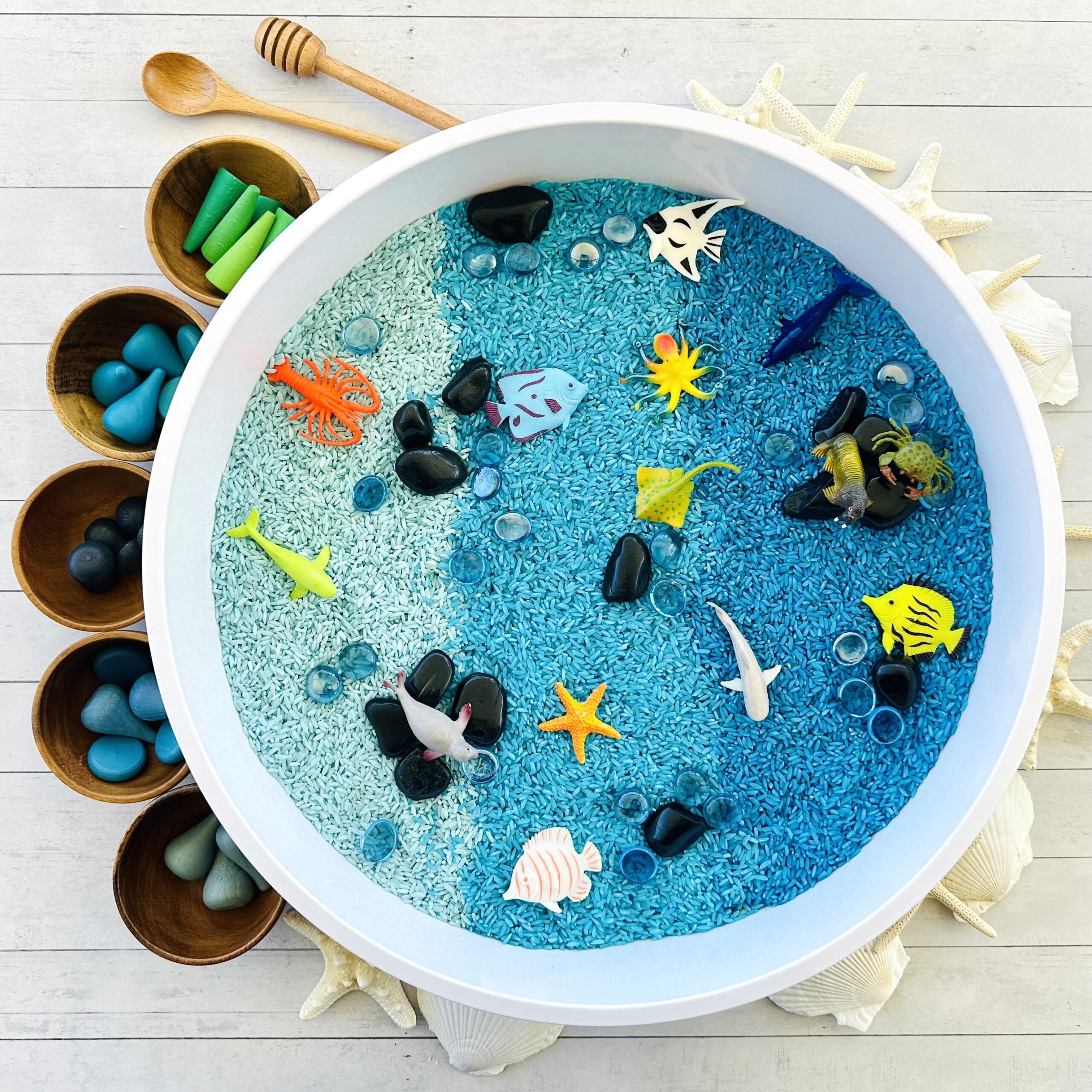 How To Make An Ocean Colored Rice Sensory Bin - Raising Wild Things Sensory