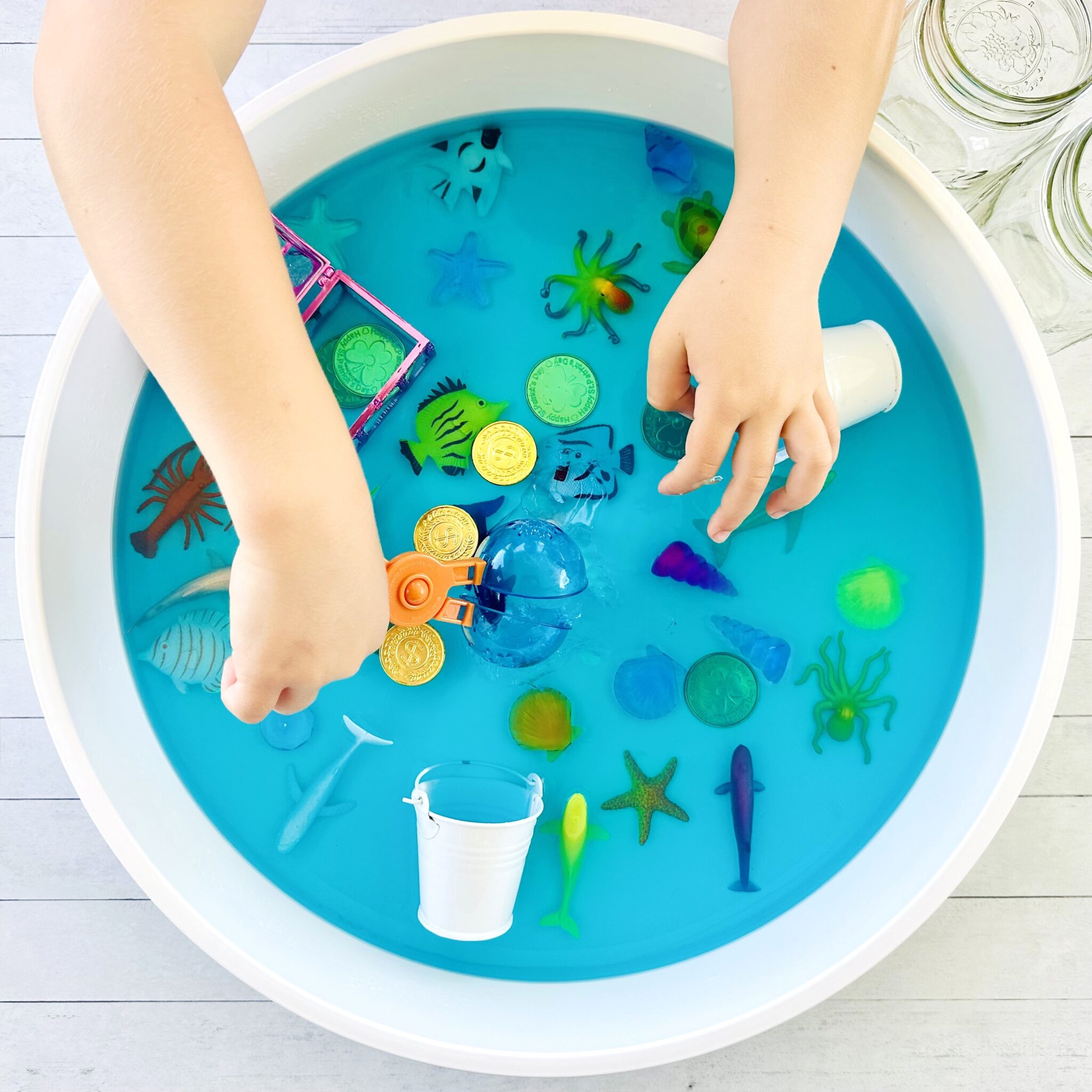 How To Make The Best Jello Ocean Sensory Bin - Raising Wild Things Sensory