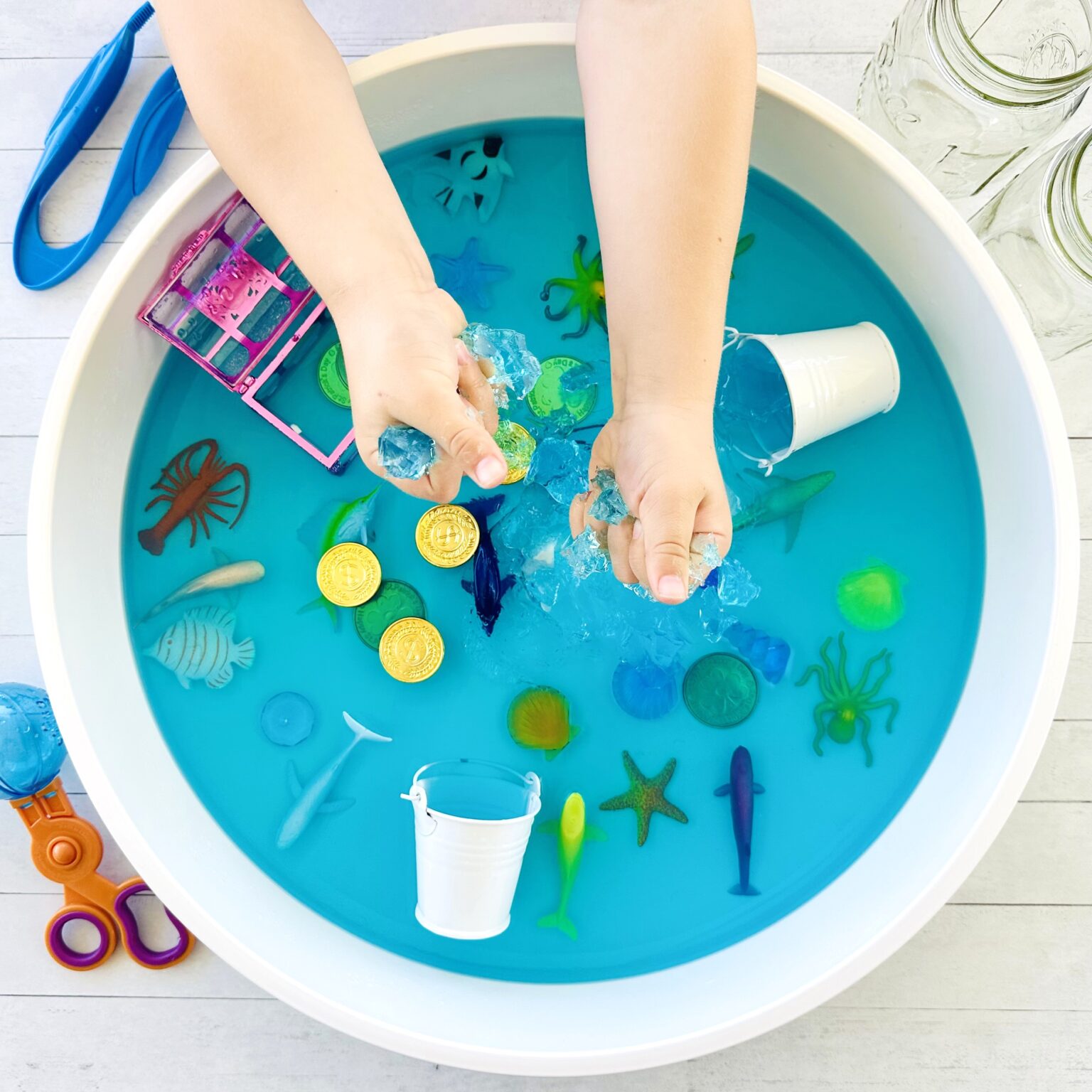 How To Make The Best Jello Ocean Sensory Bin - Raising Wild Things Sensory