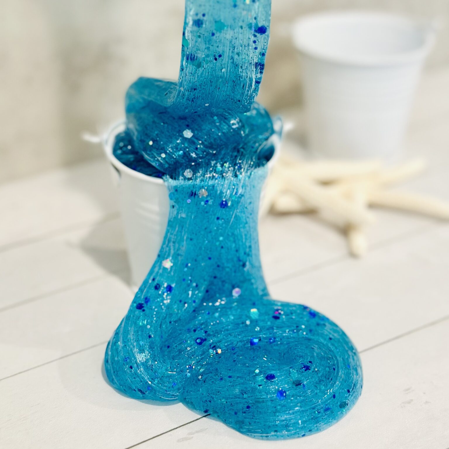 How To Make Glittery Ocean Slime (No Borax!) - Raising Wild Things Sensory