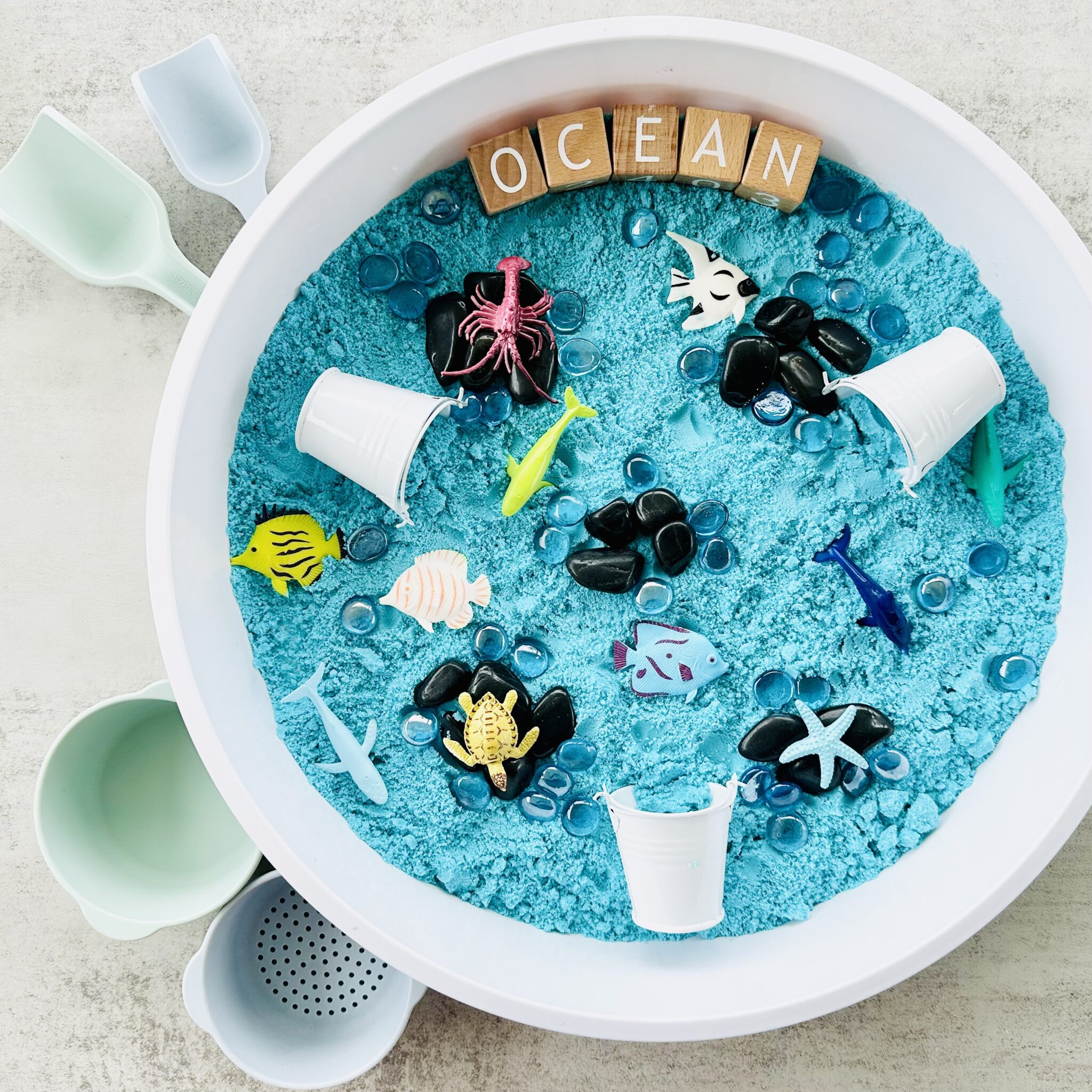 How To Make A DIY Kinetic Sand Ocean Sensory Bin - Raising Wild Things ...