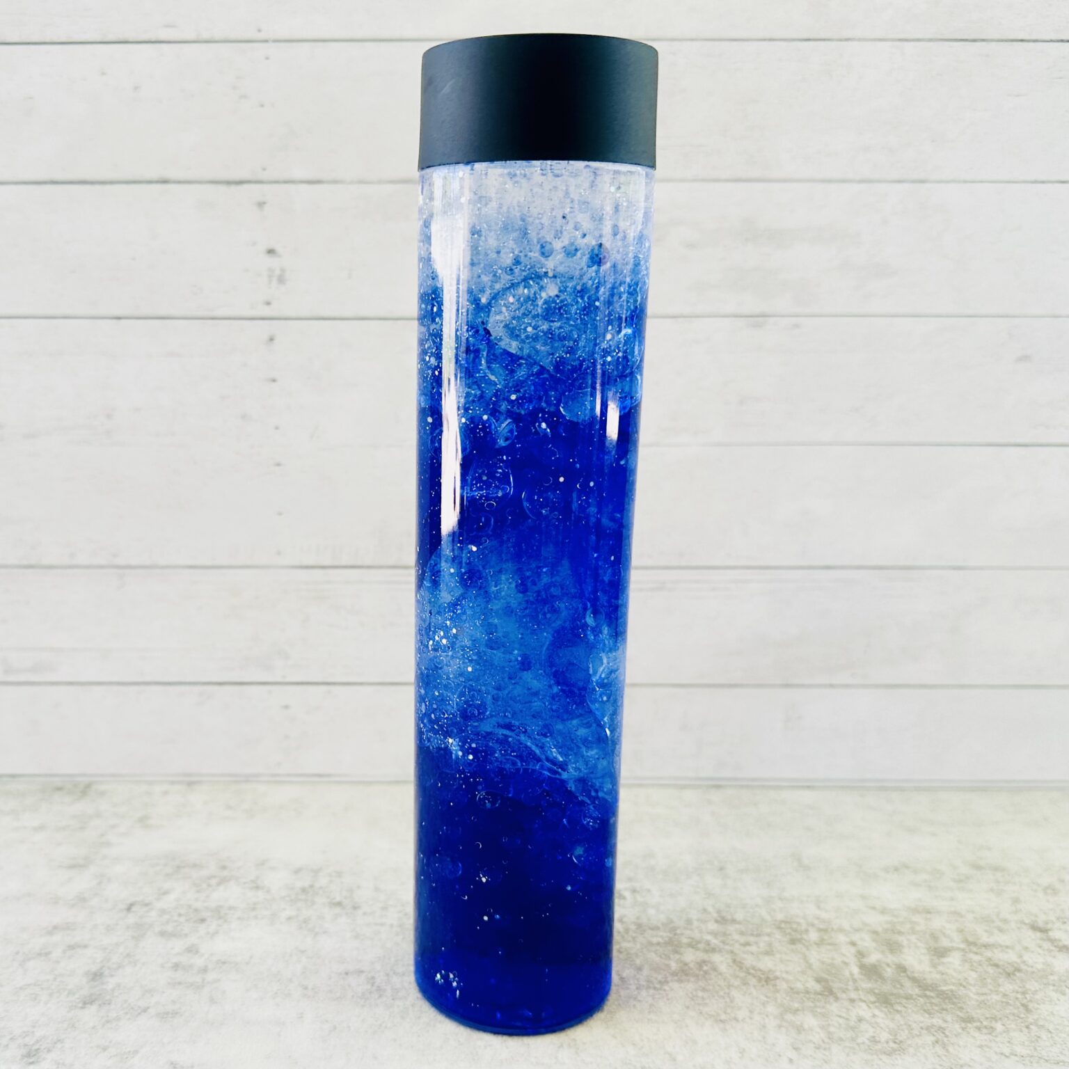 How To Make DIY Galaxy Sensory Bottles - Raising Wild Things Sensory