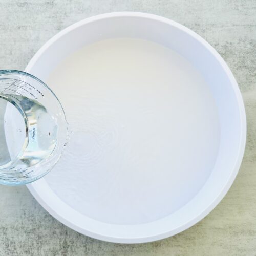How To Make Mystery Water For Sensory Play - Raising Wild Things Sensory