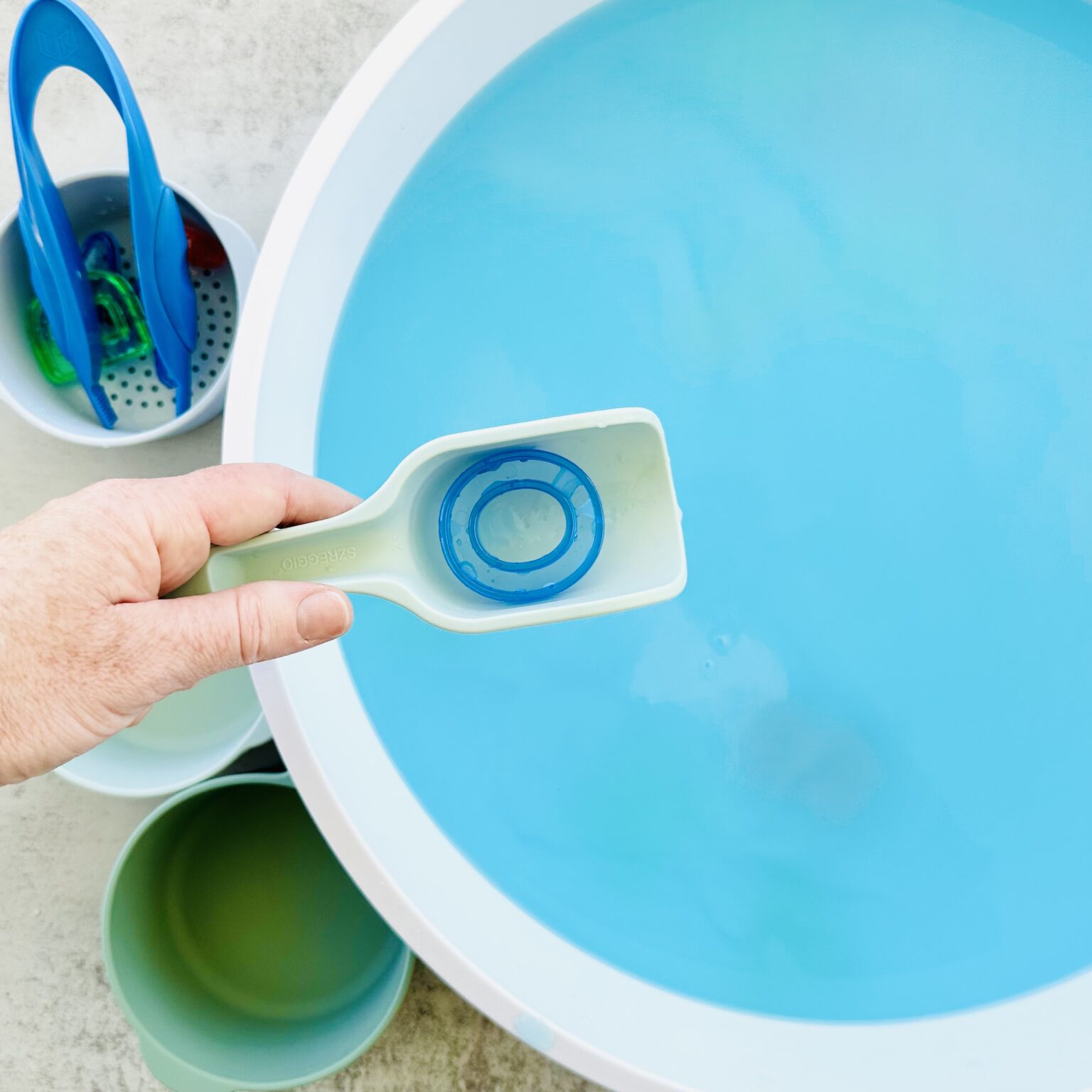 How To Make Mystery Water For Sensory Play - Raising Wild Things Sensory